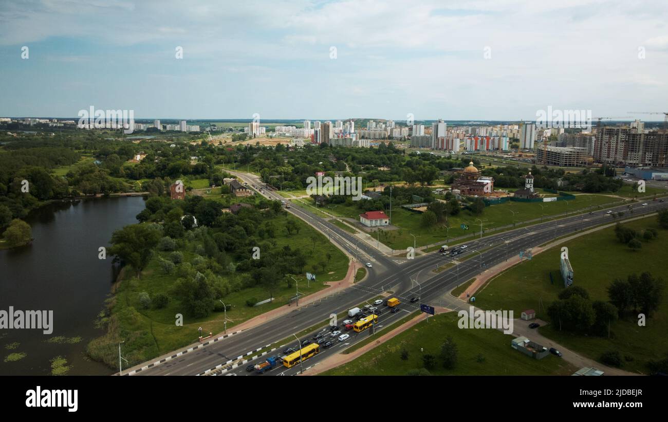 Crossroads of a large city highway. The flow of cars starts moving at a ...
