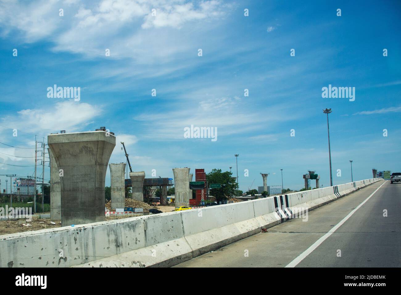 View landscape cityscape and construction site with asian people and ...