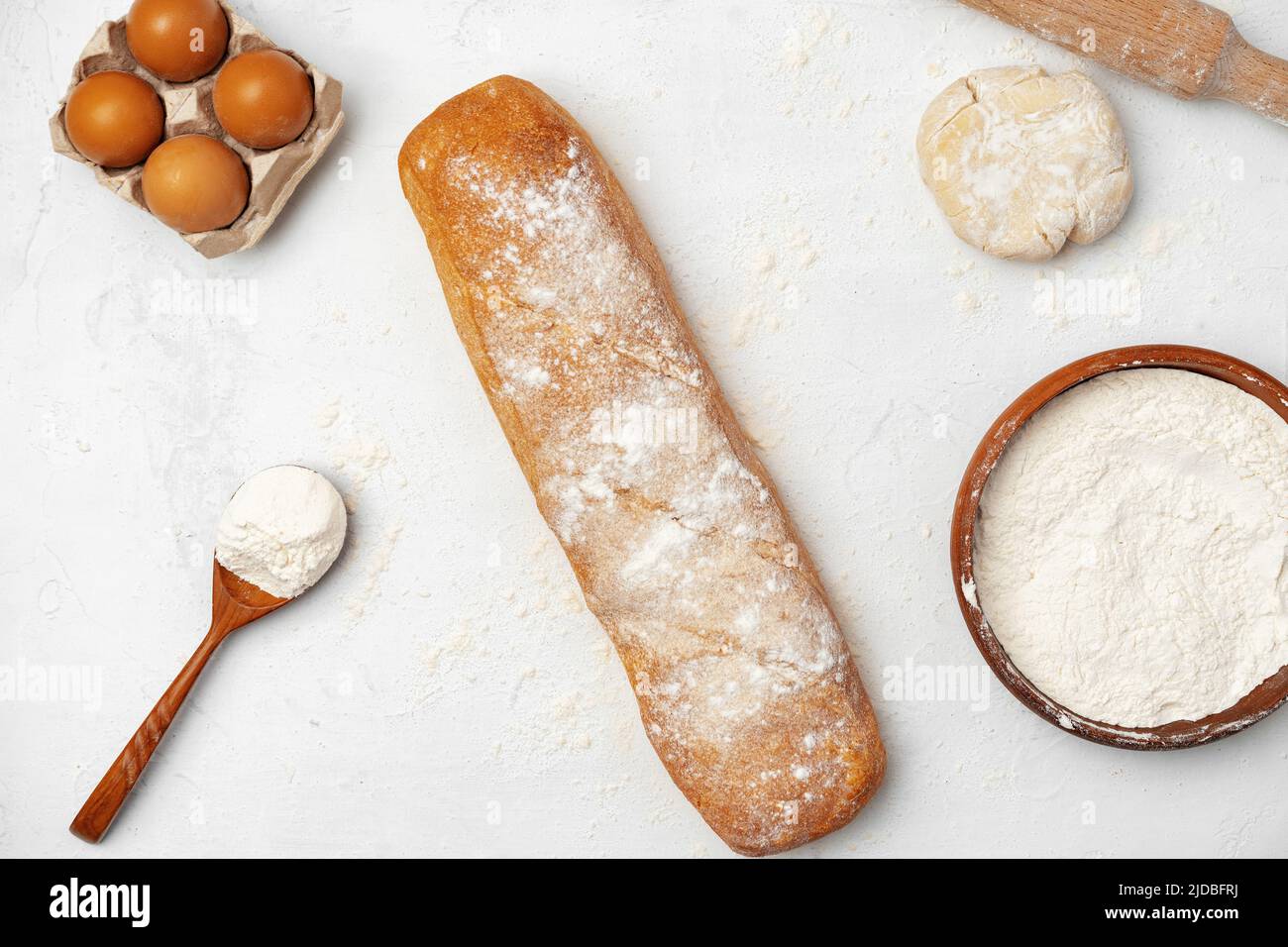 Preparation for baking. Eggs and flour on white background Stock Photo ...
