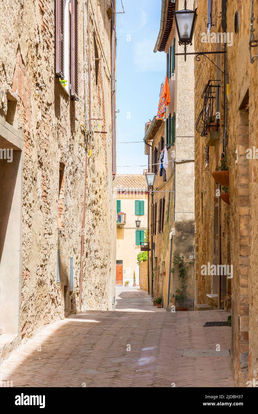 Narrow alley in an Italian village Stock Photo - Alamy