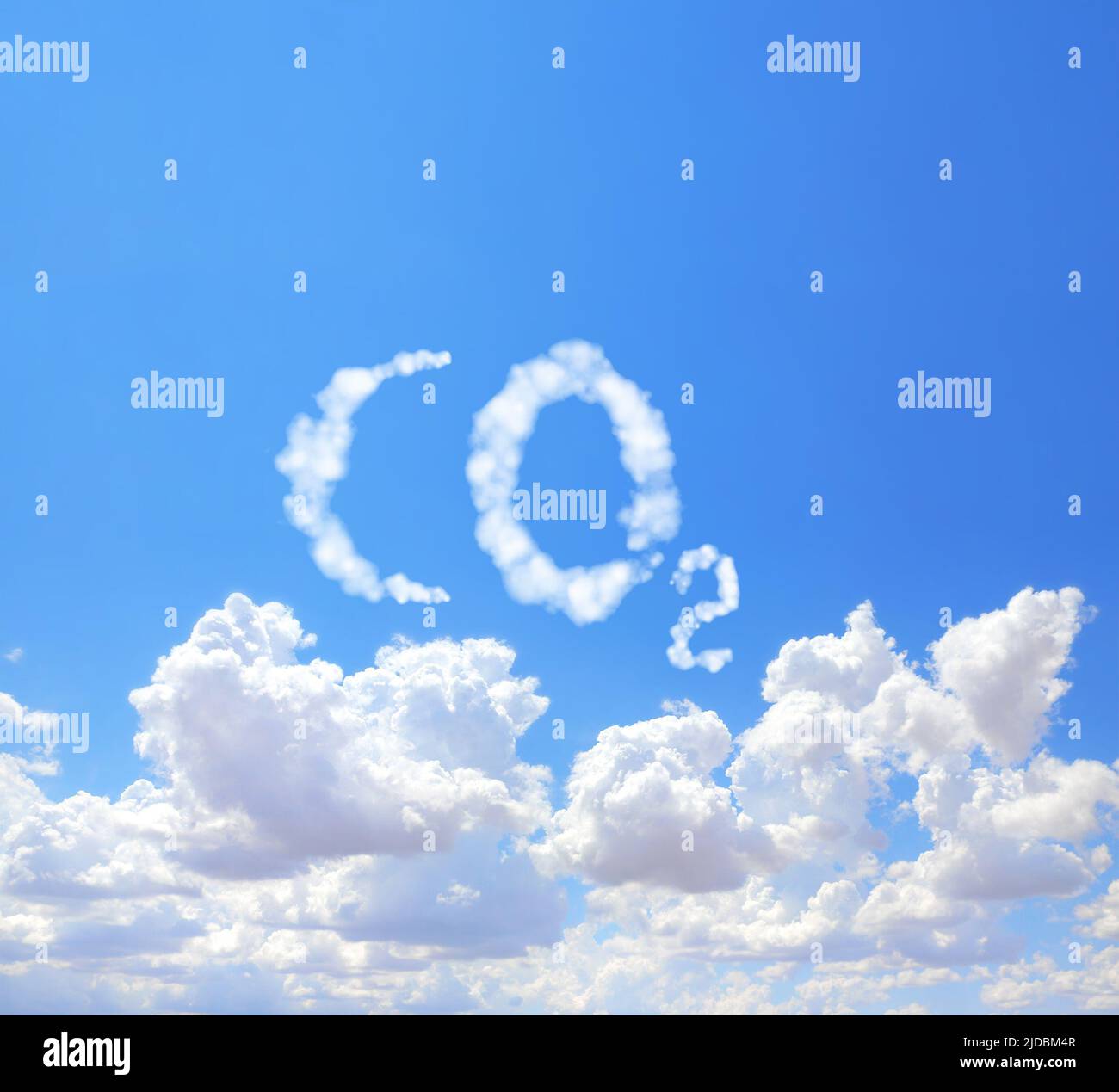 Symbol CO2 from clouds on blue sky. Carbon dioxide emission control ...