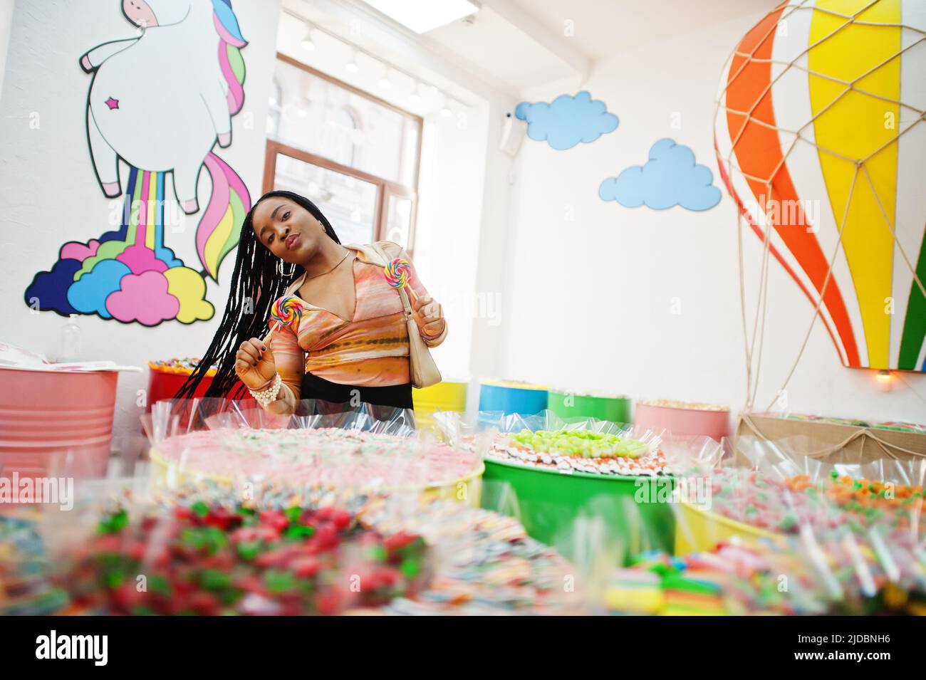 Beautiful girl marshmallow candy hi-res stock photography and images ...