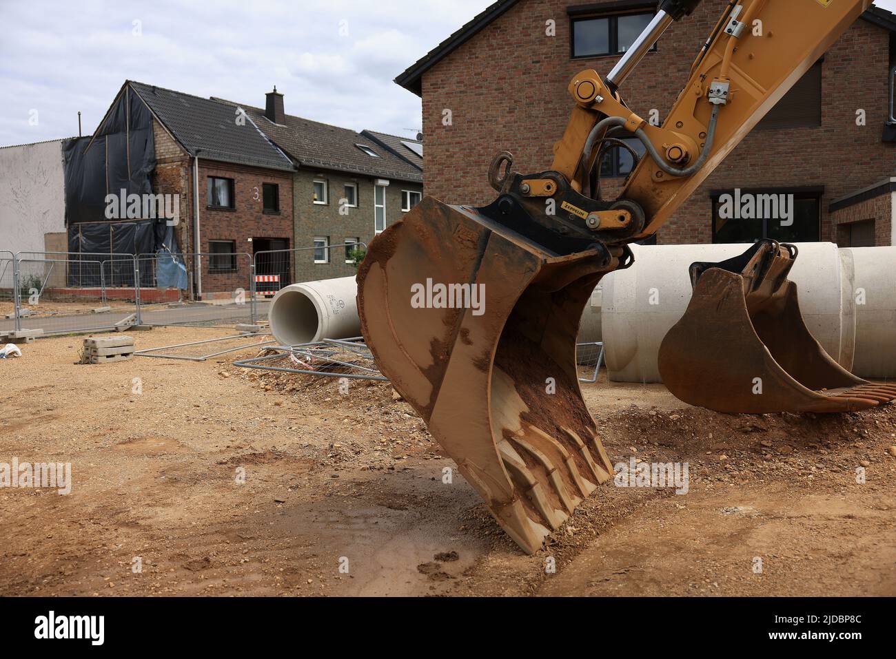 Erftstadt, Germany. 10th June, 2022. Excavators stand at the edge of ...