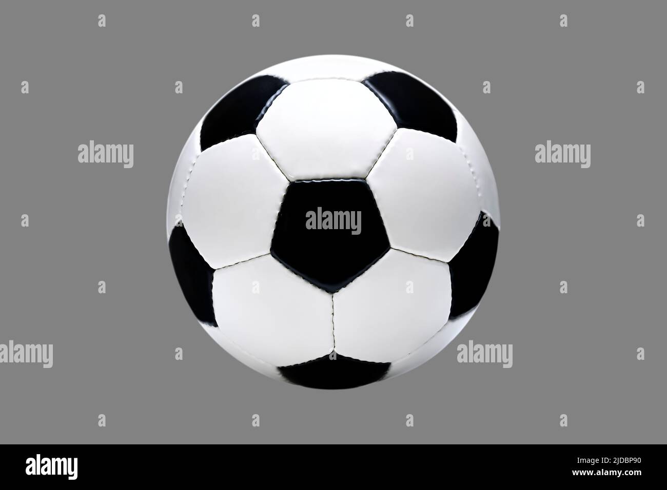 Soccer ball in front of grey background Stock Photo - Alamy