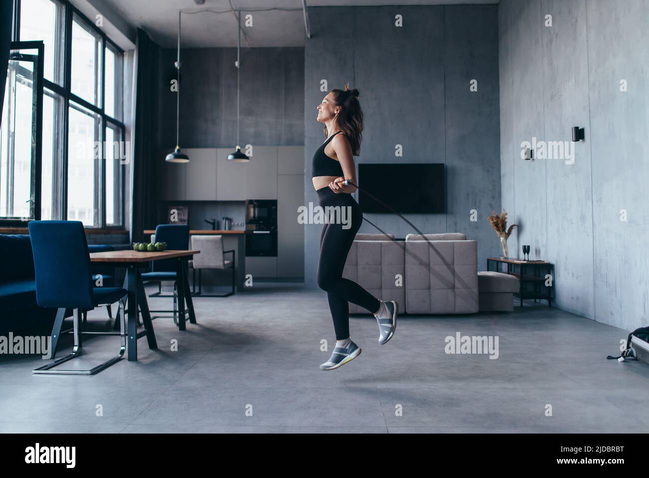 Athlete doing workout skipping rope hi-res stock photography and images ...