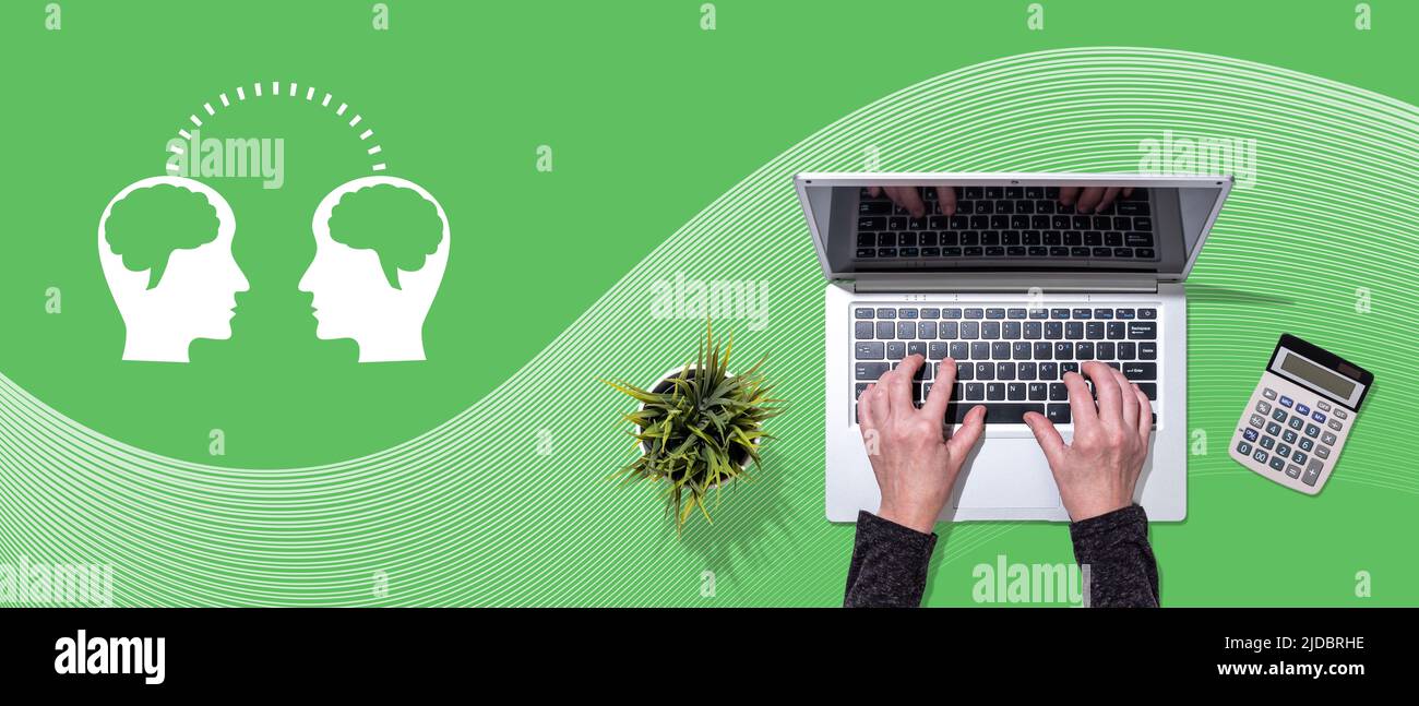Top view of hands using laptop with symbol of knowledge sharing concept ...