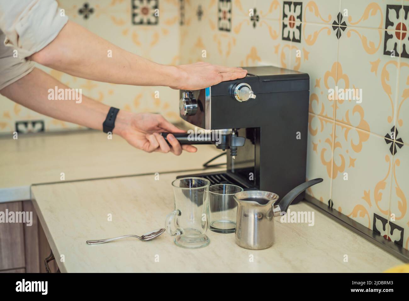 Man using machine pot hi-res stock photography and images - Alamy