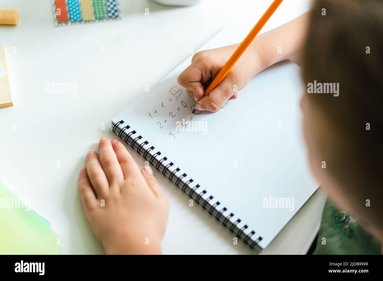 Distance learning online education. Kid boy studying at home with book ...