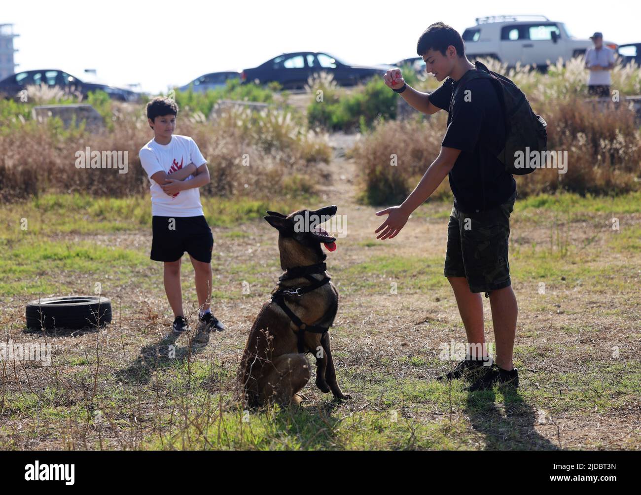 Beirut, Lebanon. 18th June, 2022. A man trains his dog at an opening ...