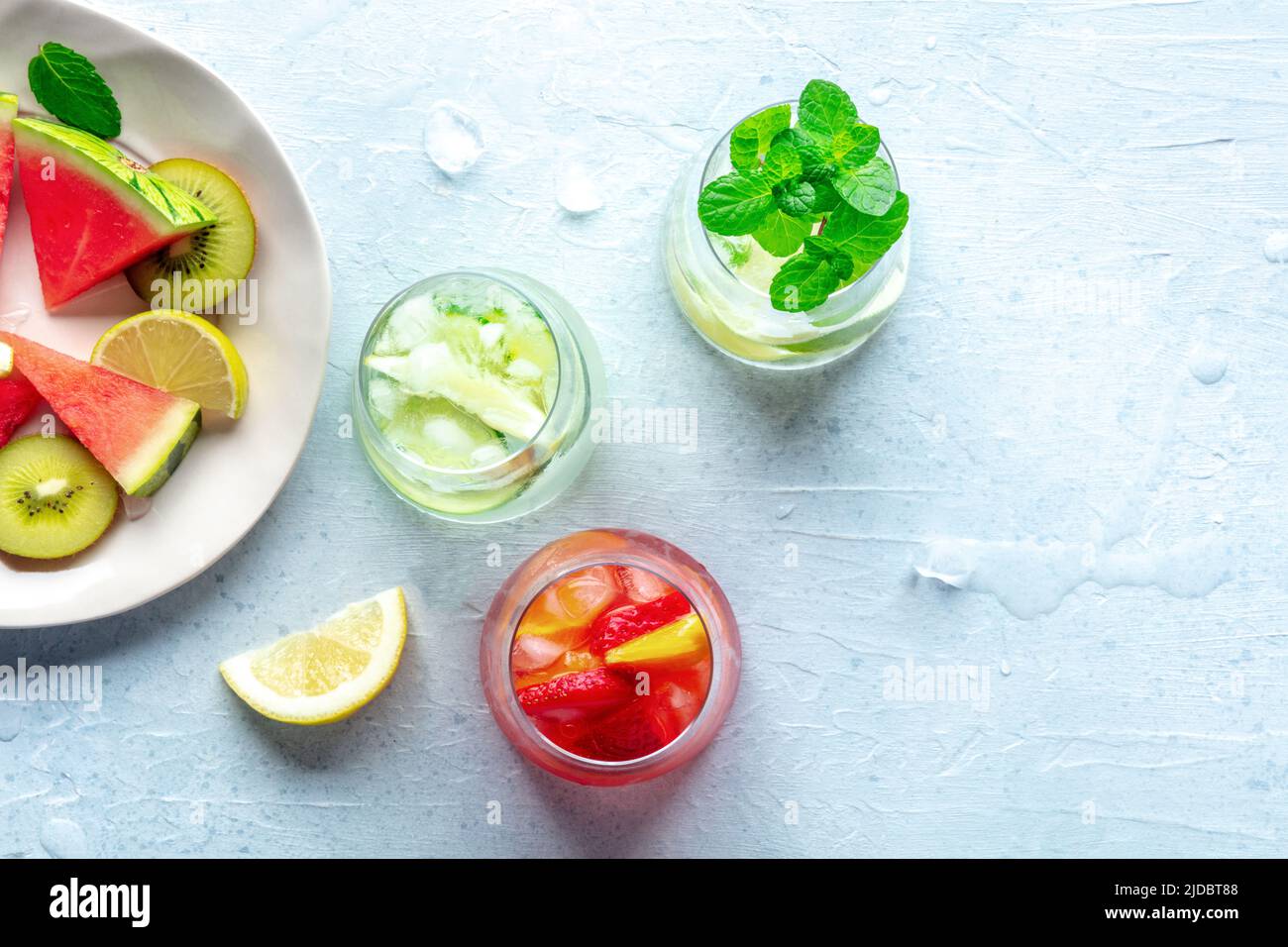 Summer cocktails, overhead flat lay shot with copy space. Cold drinks ...