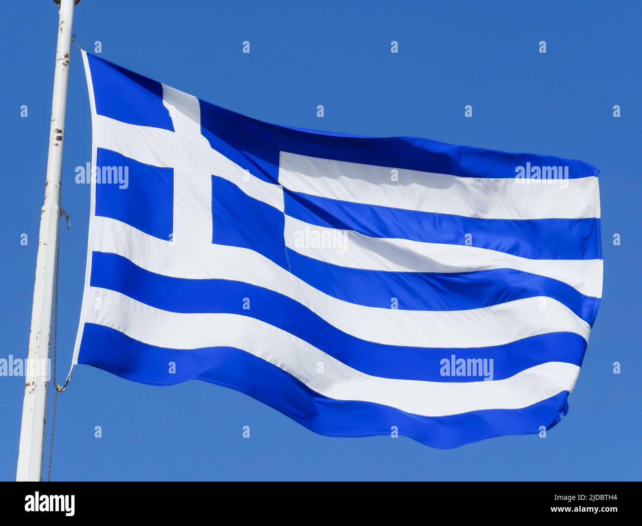 Greek Flag flying atop the Acropolis Hill in Athens, Greece Stock Photo ...