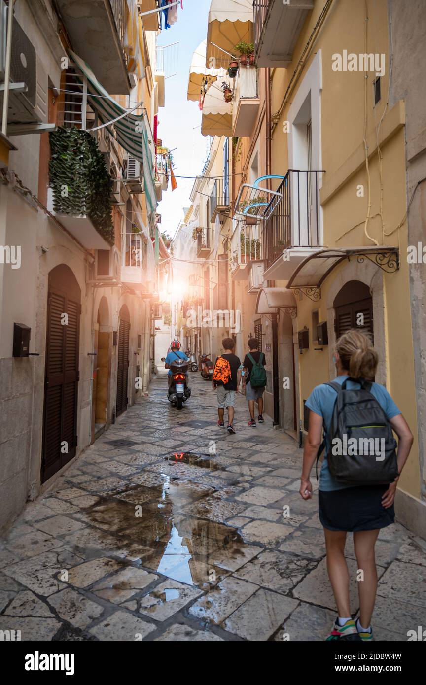 Bari, Puglia, Italy. August 2021. Tourists in the alleys of the ...