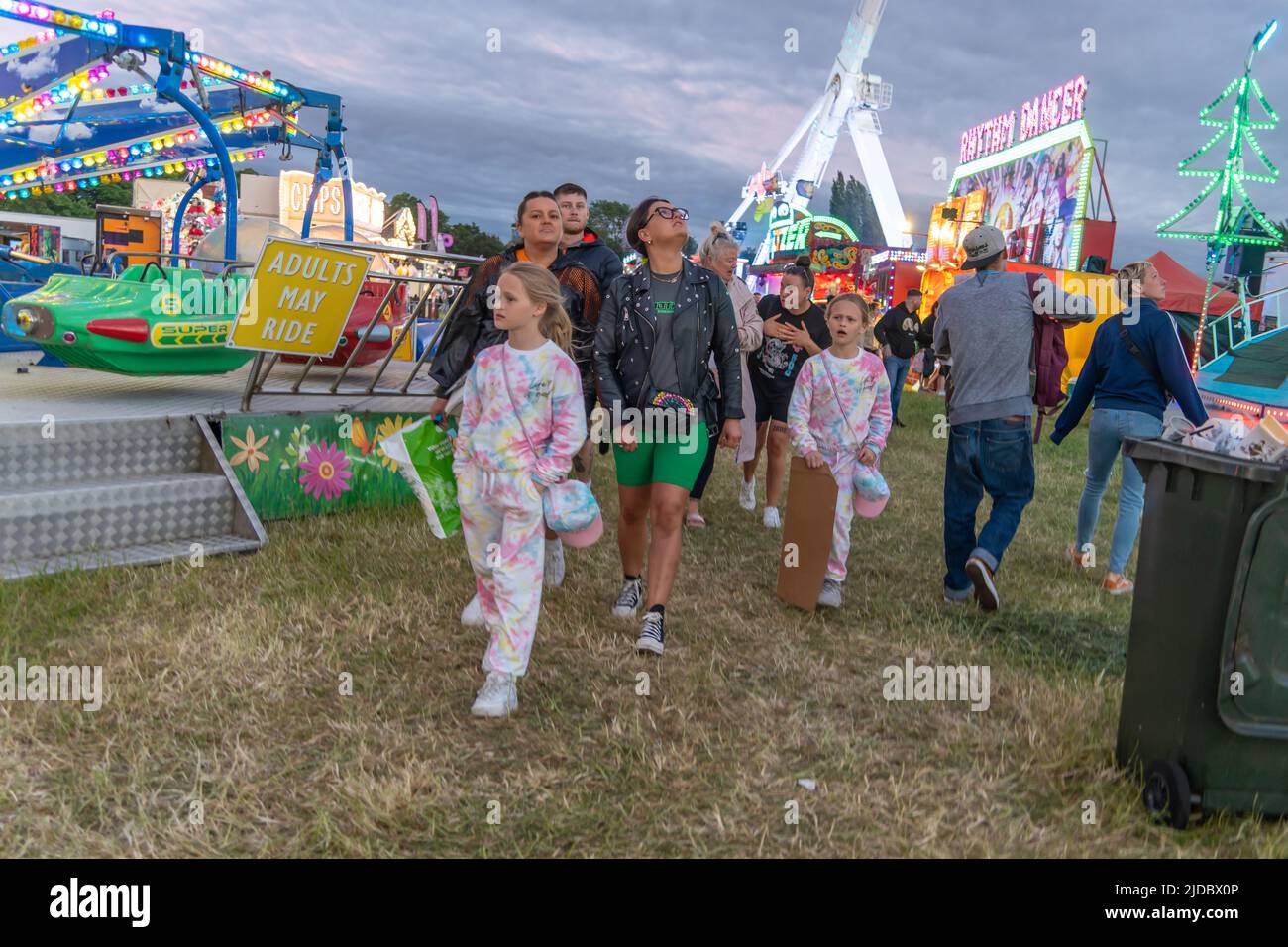 People spending leisure time at the funfair. The 140th 'Hoppings' on ...