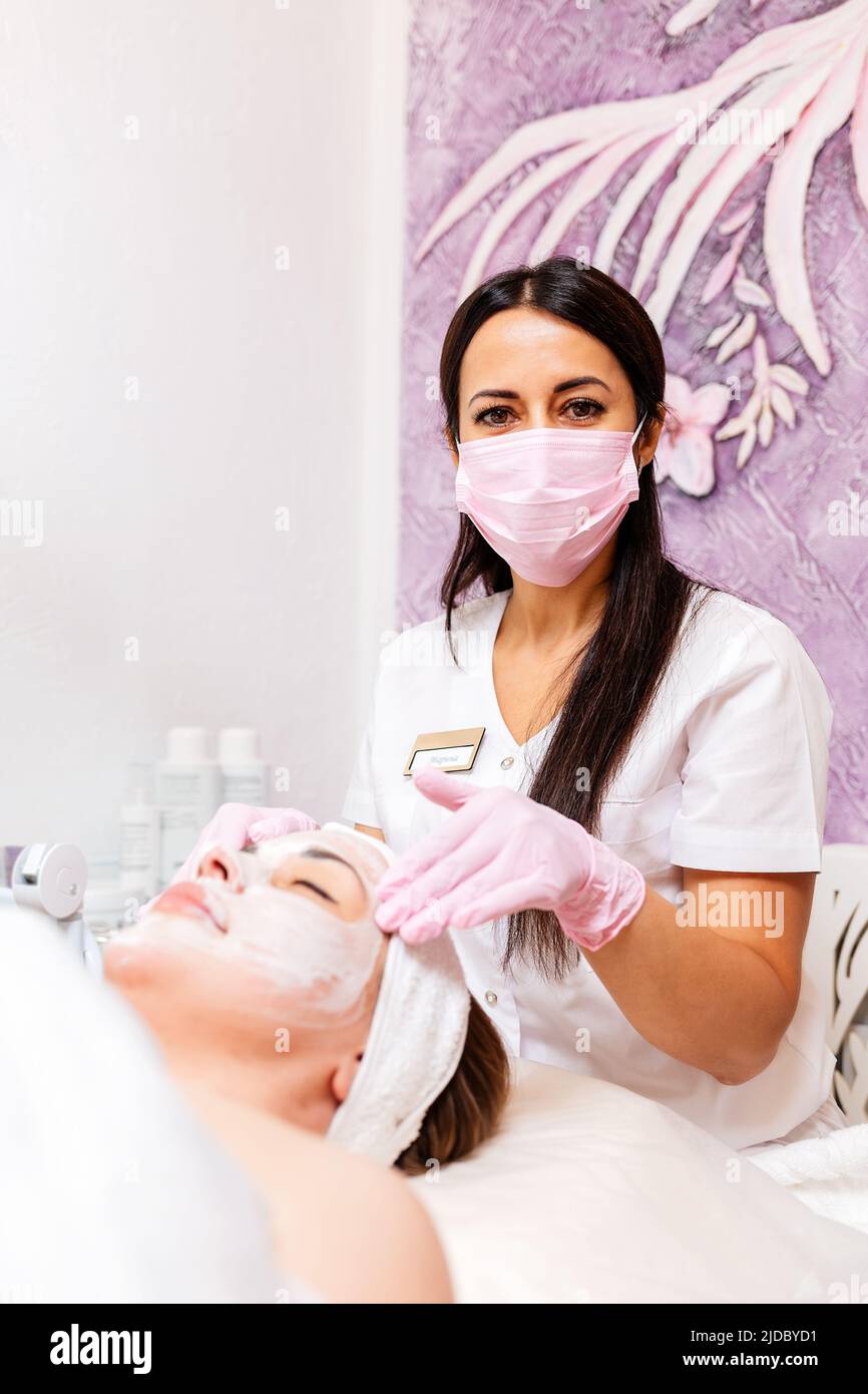 New Normal Cosmetologist At Protective Mask And Medical Gloves