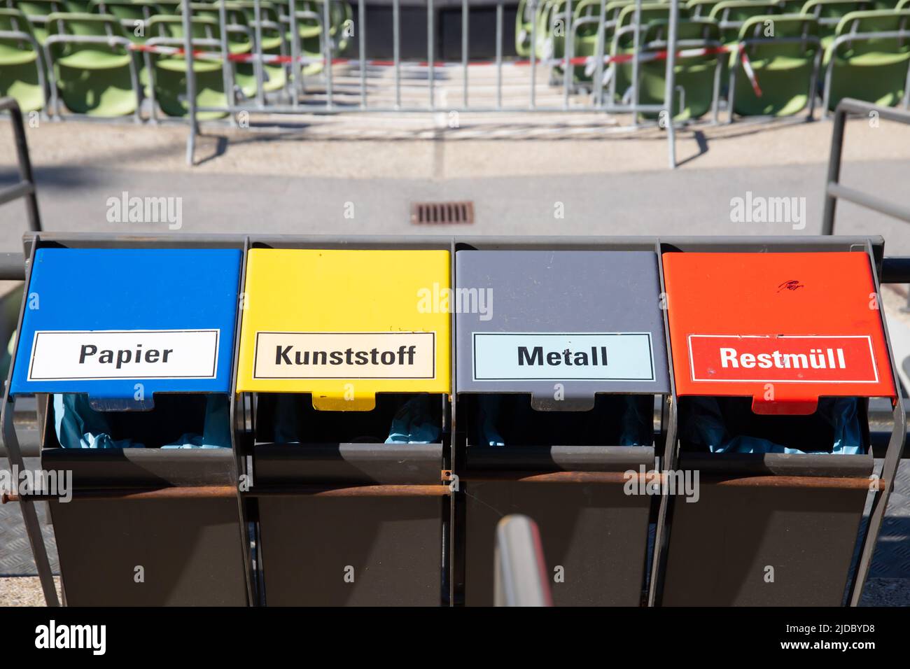 Metal containers for different garbage with an inscription in german at ...