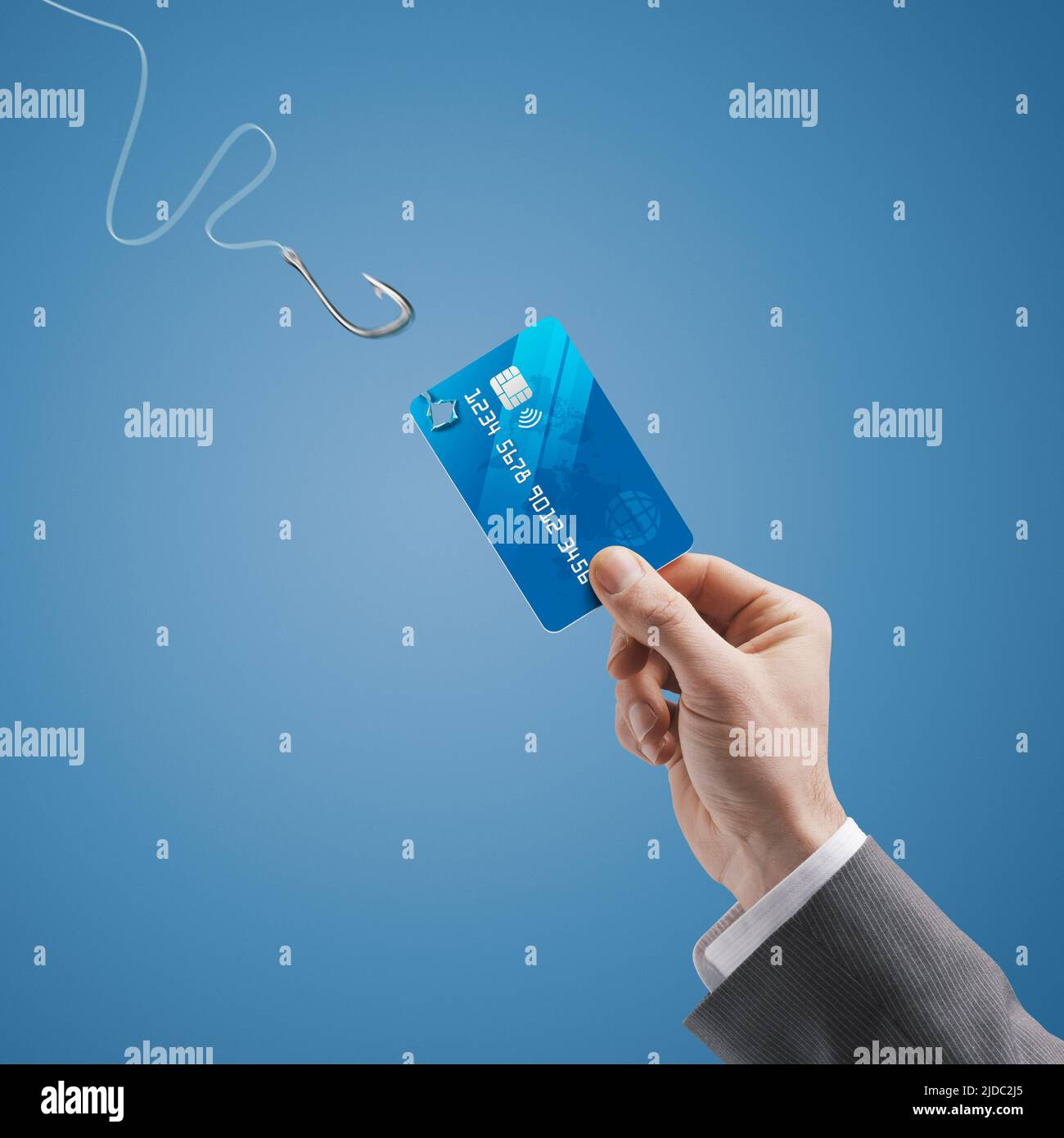 Thief stealing a businessman's credit card with a hook, phishing and ...