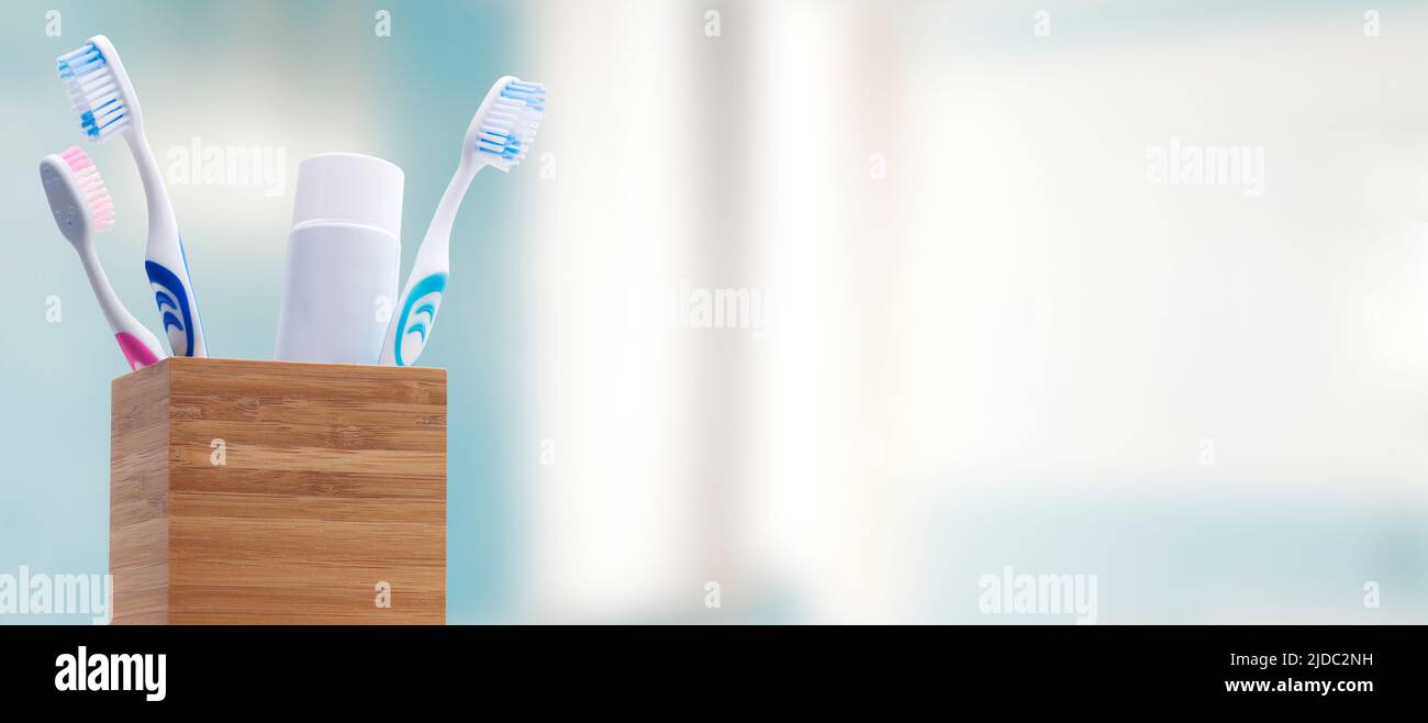 Toothbrush holder with toothbrushes and toothpaste, dental hygiene ... Toothbrush holder with toothbrushes and toothpaste, dental hygiene ...