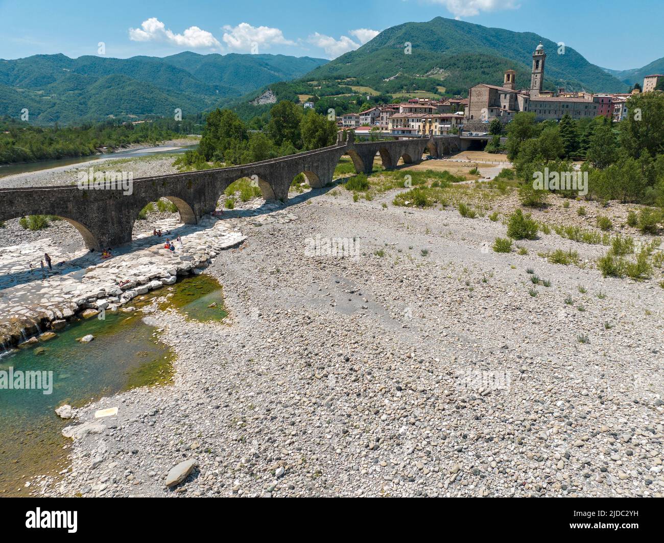 Aerial view. Drought and dry rivers. Roman bridge of Bobbio over the ...