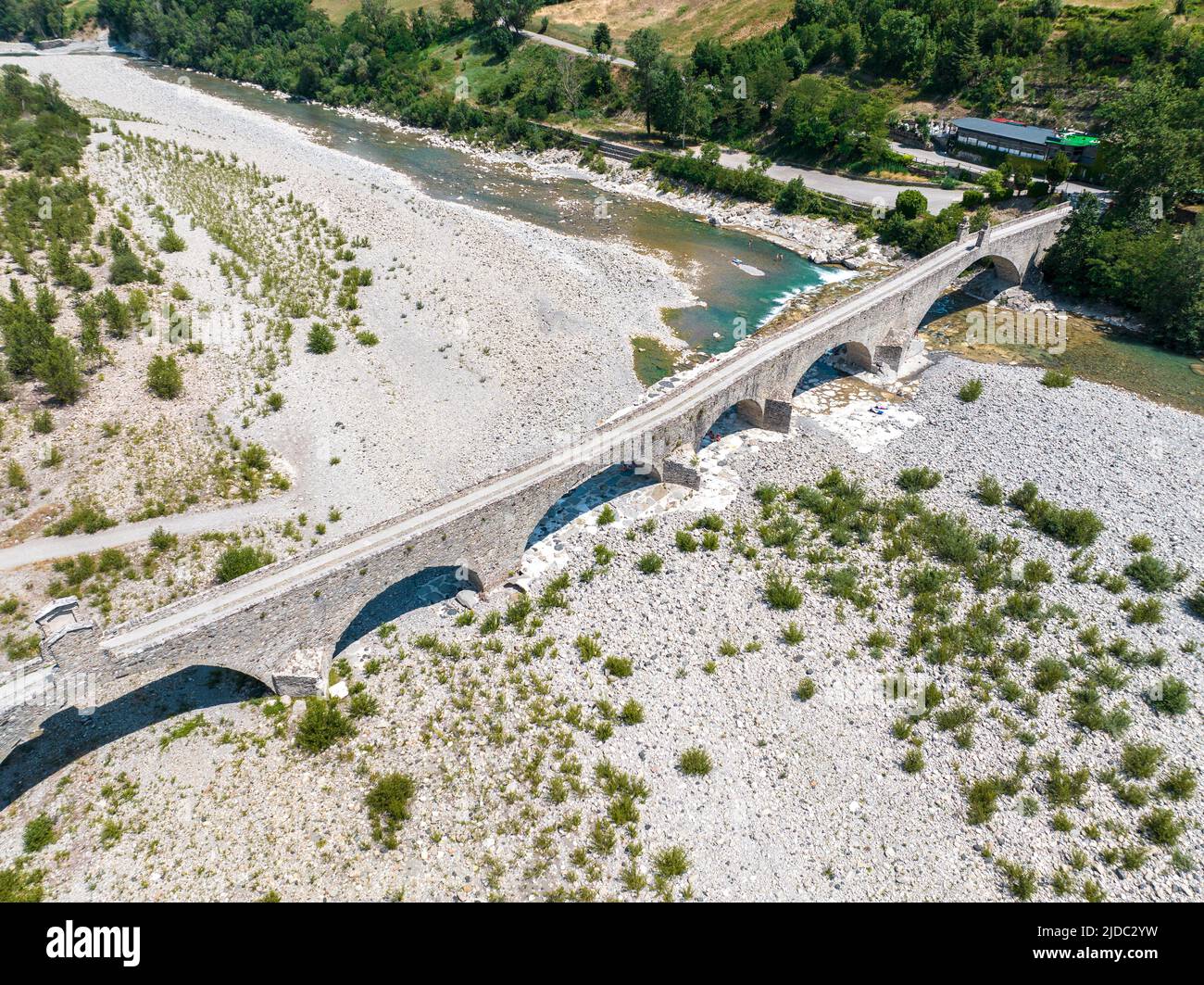 Aerial view. Drought and dry rivers. Roman bridge of Bobbio over the ...