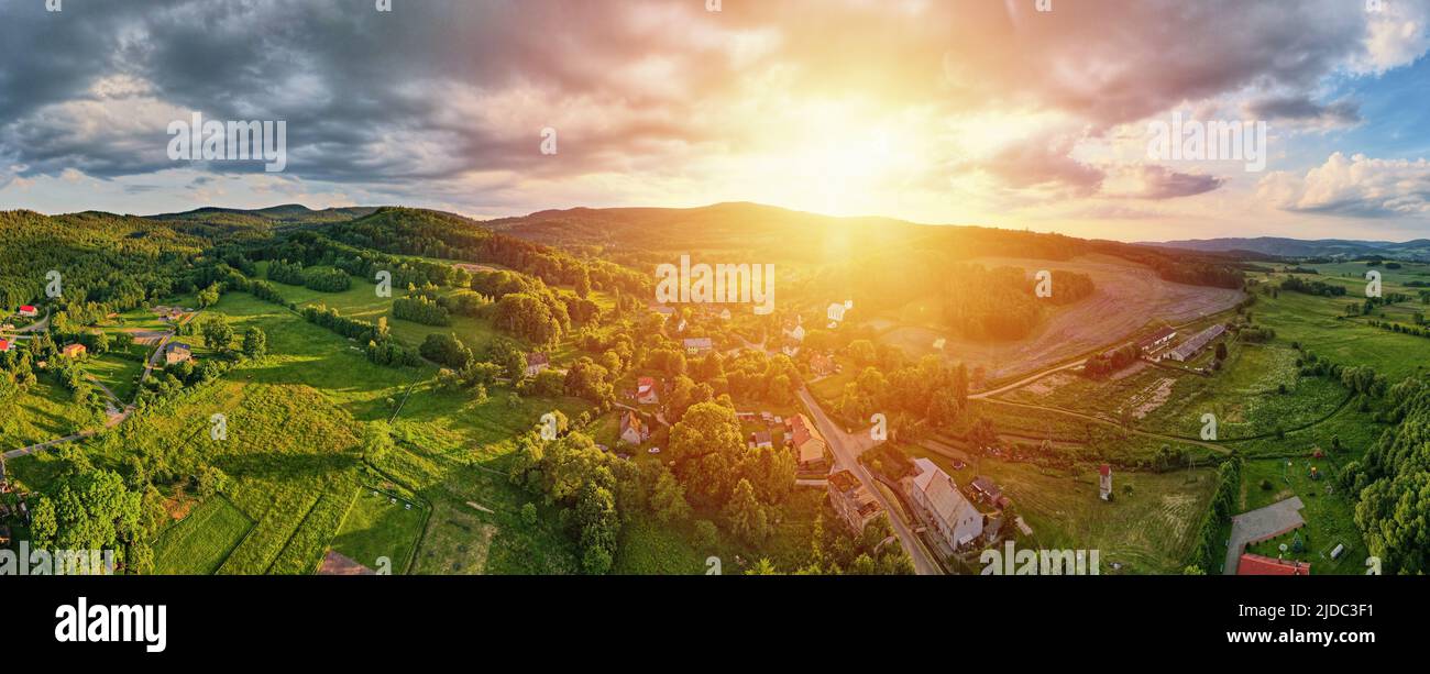 Aerial panorama of countryside town at summer sunset hi-res stock ...