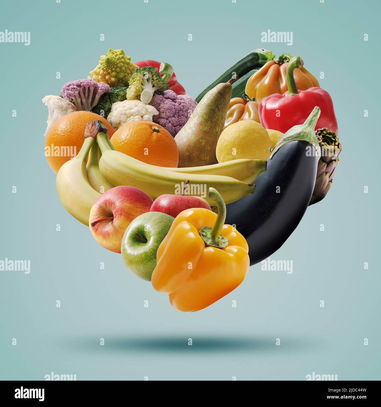 Fruits and vegetables arranged in a heart shape, healthy food and ...