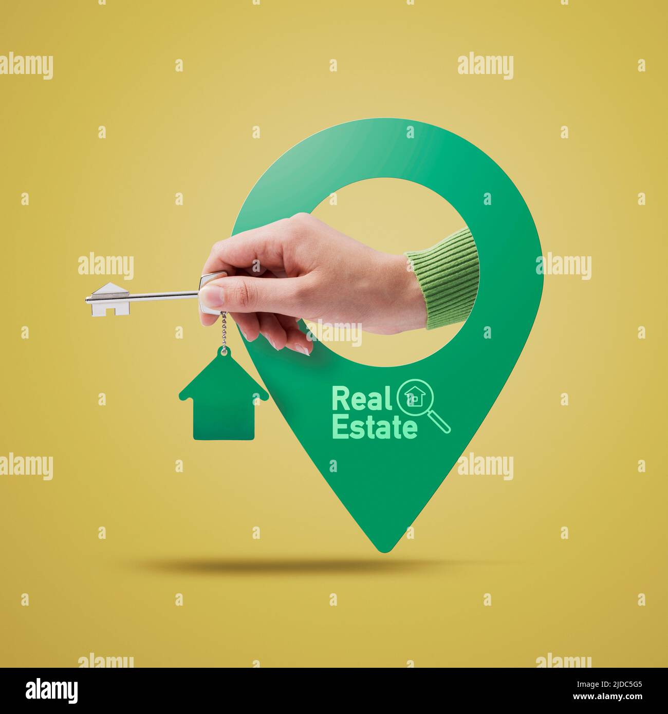 Hand holding house keys and location pin, real estate concept Stock ...