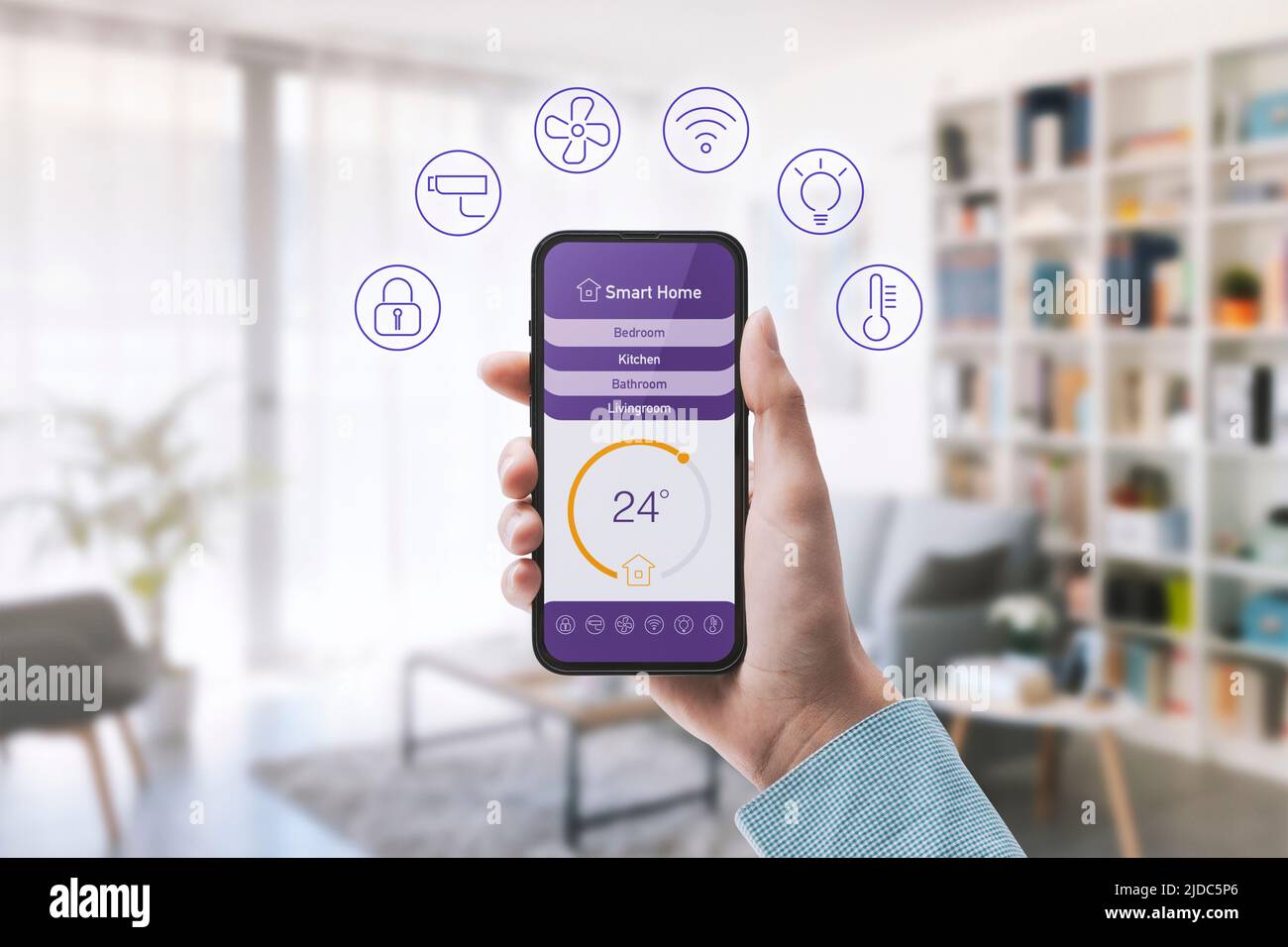 Woman controlling her smart home from her phone, control panel ...