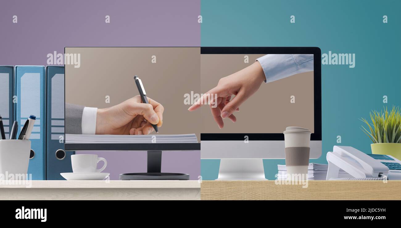 Corporate business people working online: a man is signing a document ...