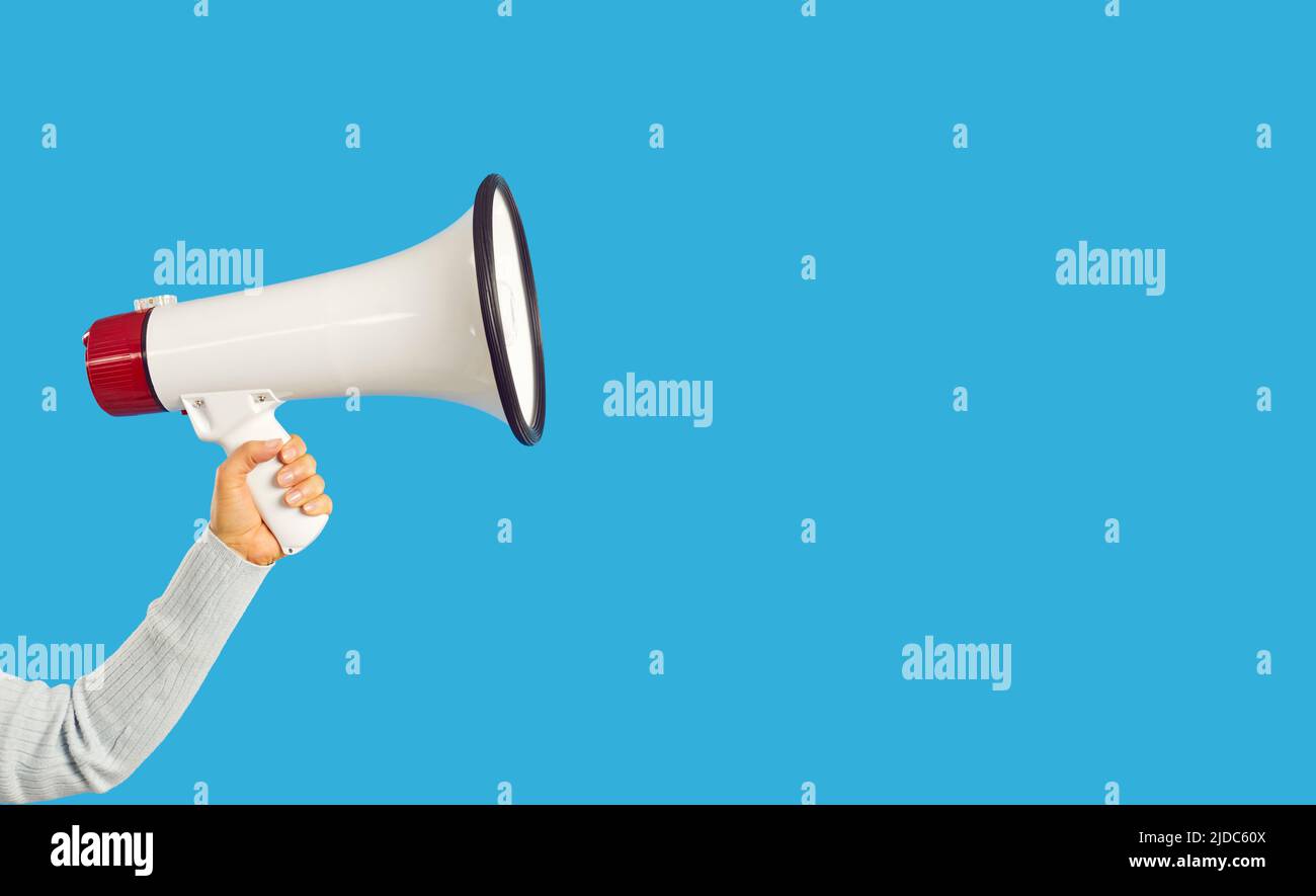 Person hold loudspeaker make announcement Stock Photo - Alamy