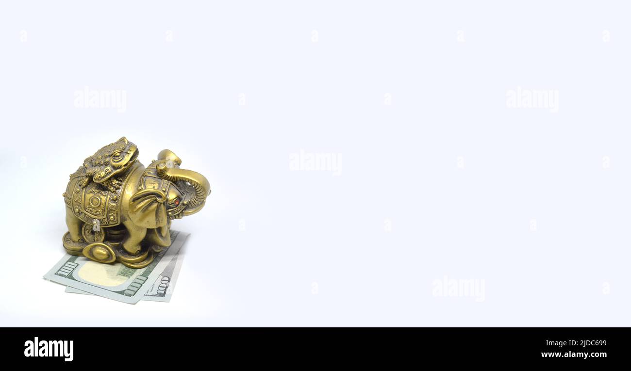 Statuette of the bronze elephant on white background. The Symbol wealth ...