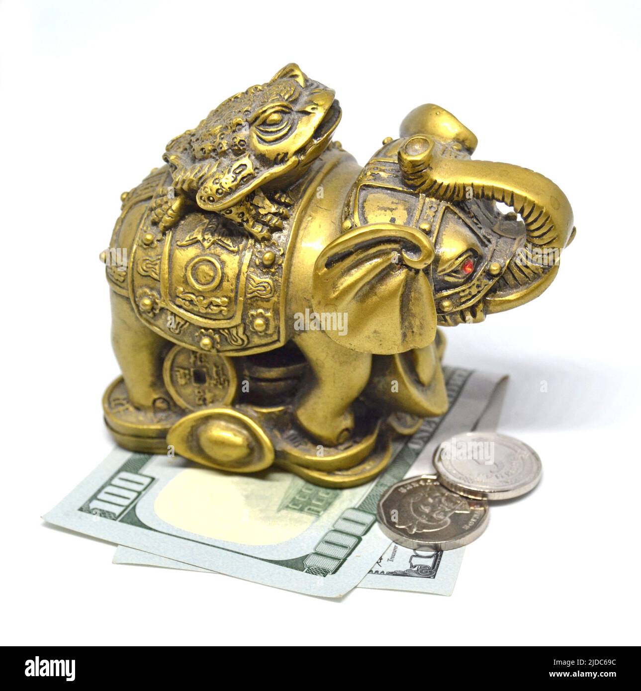 Statuette of the bronze elephant on white background. The Symbol wealth ...