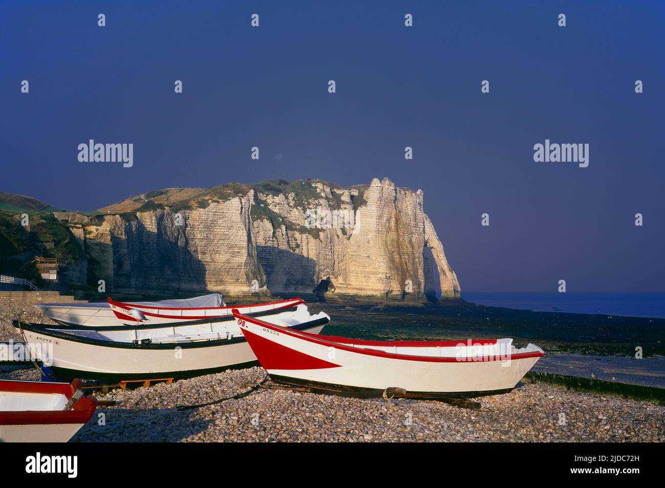 France, Seine-Maritime Etretat, the pebble beach, the colorful boats ...