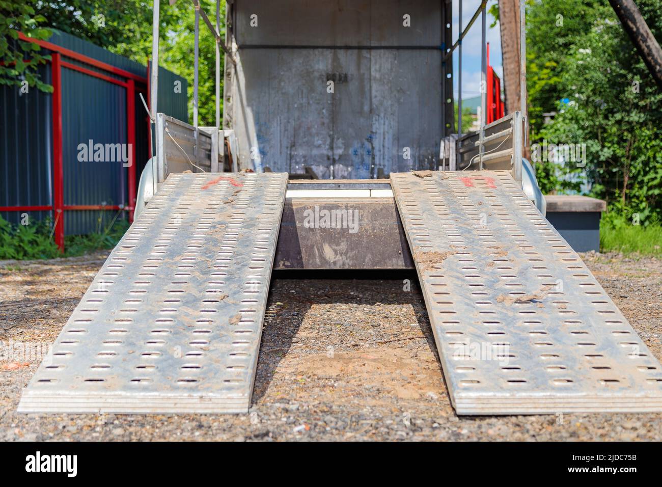 Mobile platform for the exit of vehicles from a trailer Stock Photo - Alamy