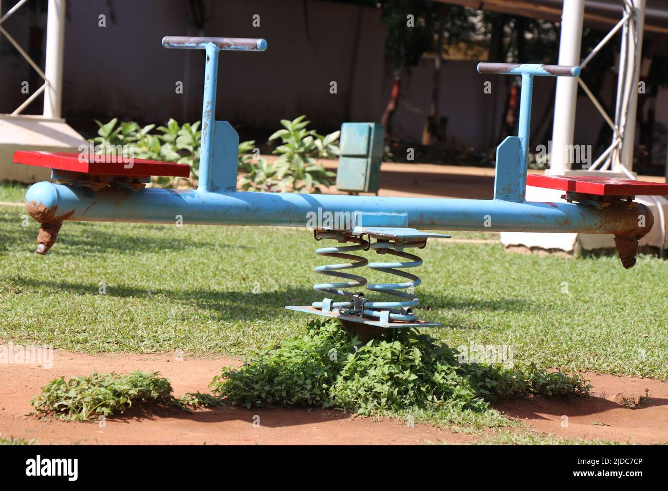 Spring see saw for kids to play in a garden in natural daylight Stock ...