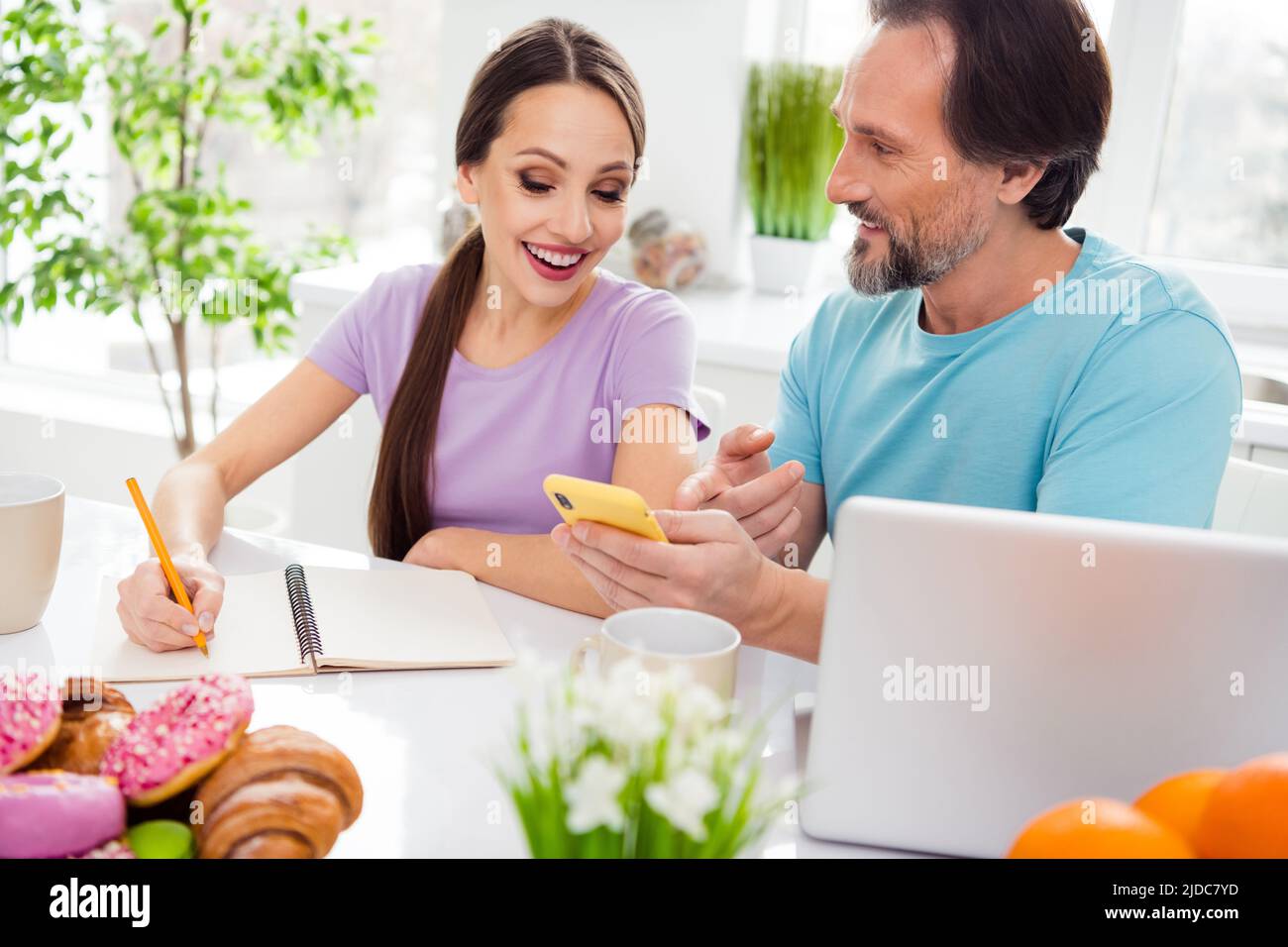 Portrait of attractive lady handsome man use netbook telephone pay ...