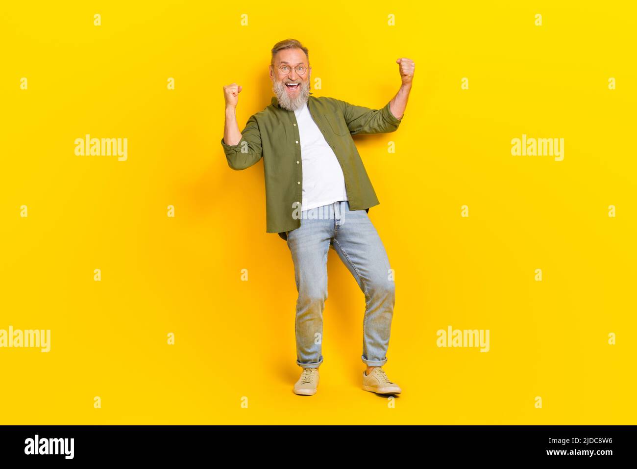 Full size portrait of delighted person raise fists celebrate success ...
