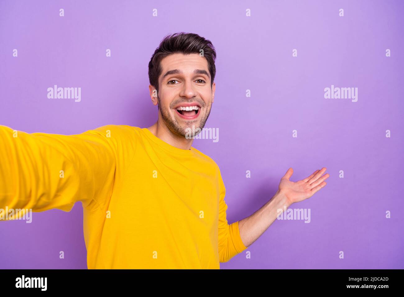 Photo of good mood male take selfie show hand demonstrate big bargains ...