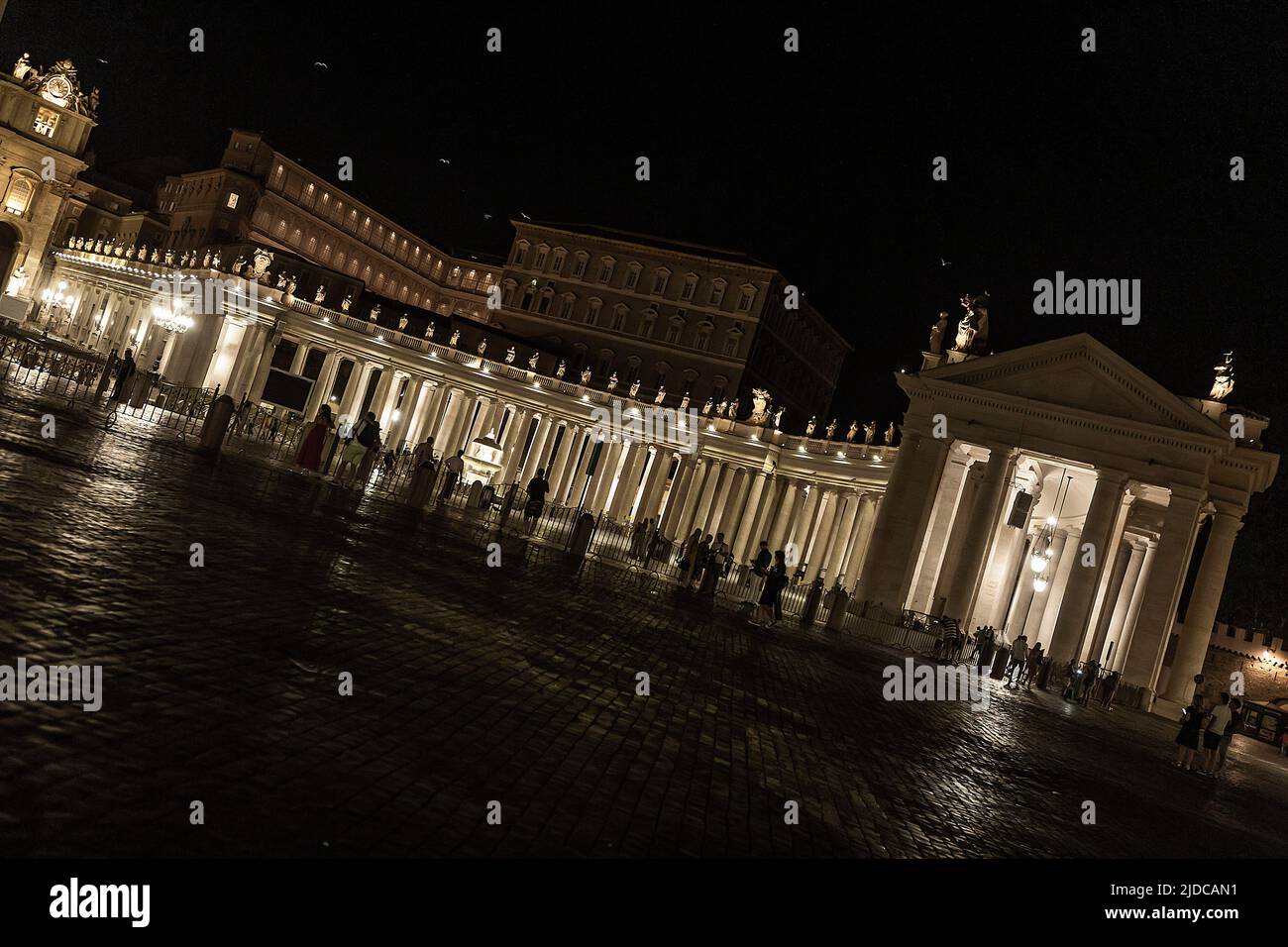 Saint Peter's square colonnade at night in Rome Stock Photo - Alamy