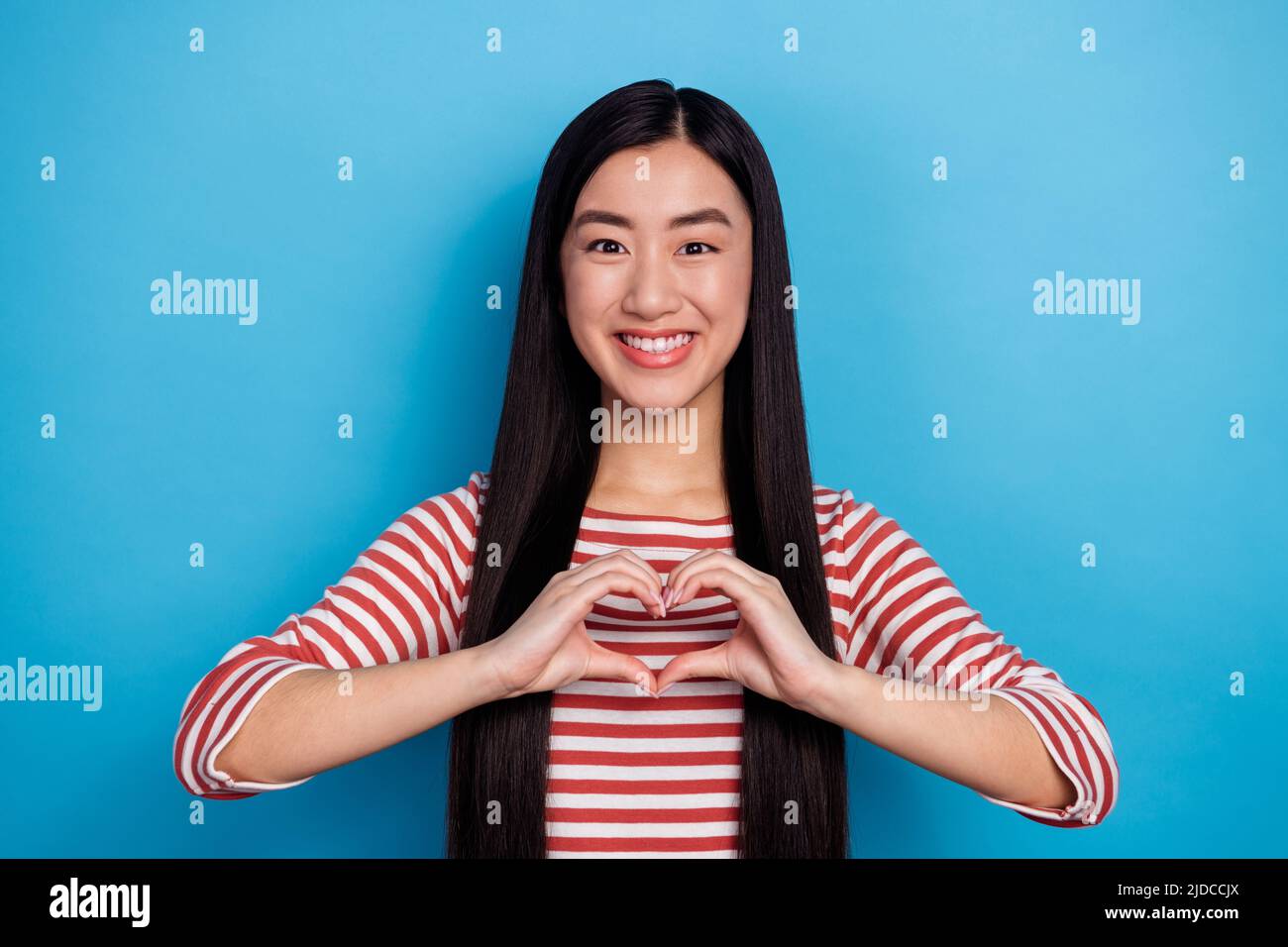 Portrait of cheerful adorable filipino lady arms fingers demonstrate ...