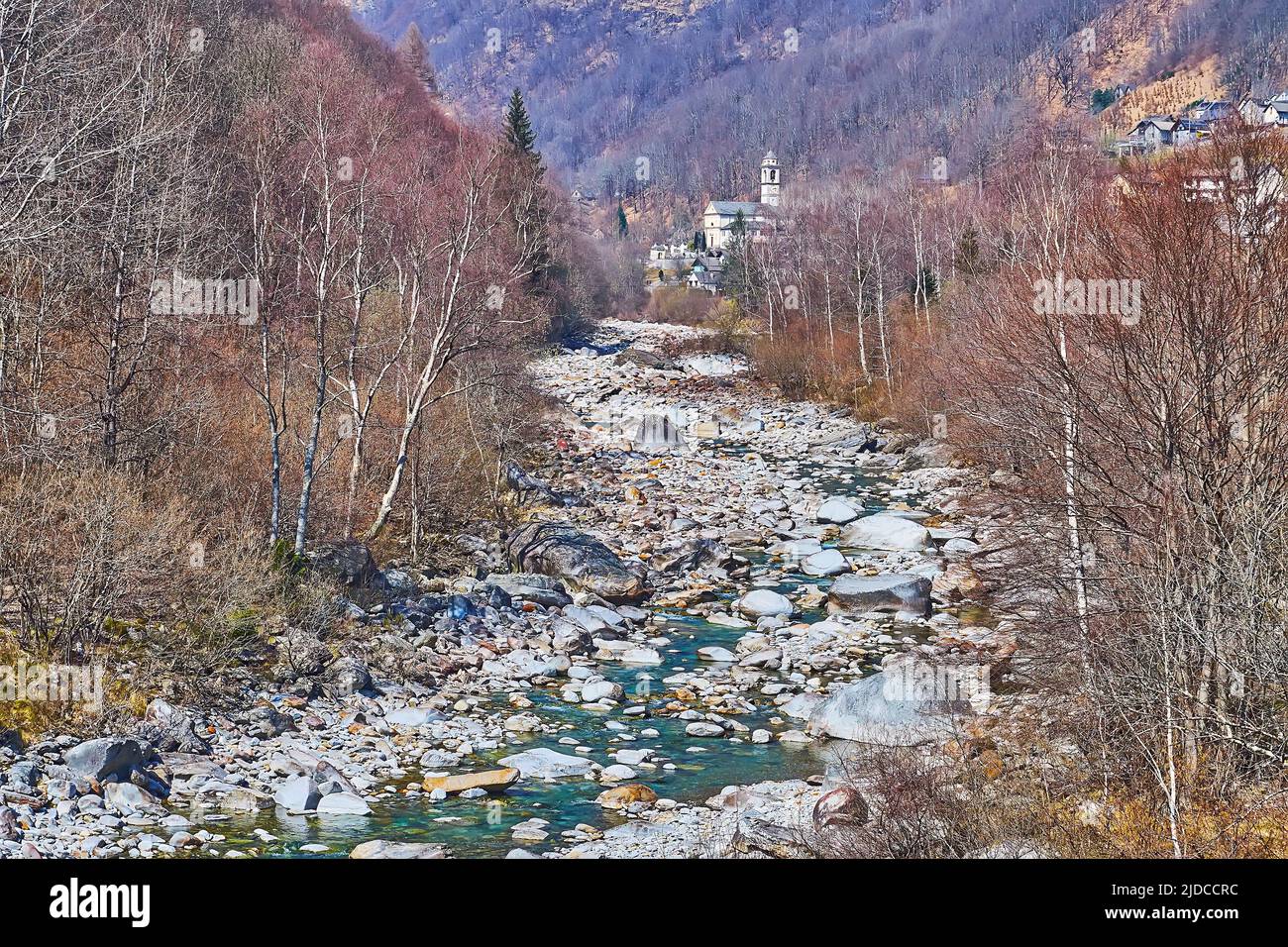 The narrow curved mountain Verzasca River with rocky baseflow, deep ...