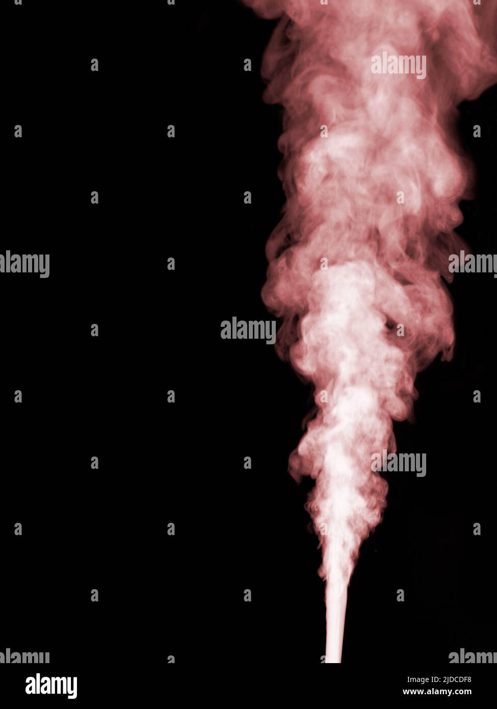 Effect of rising orange smoke on a black background Stock Photo - Alamy