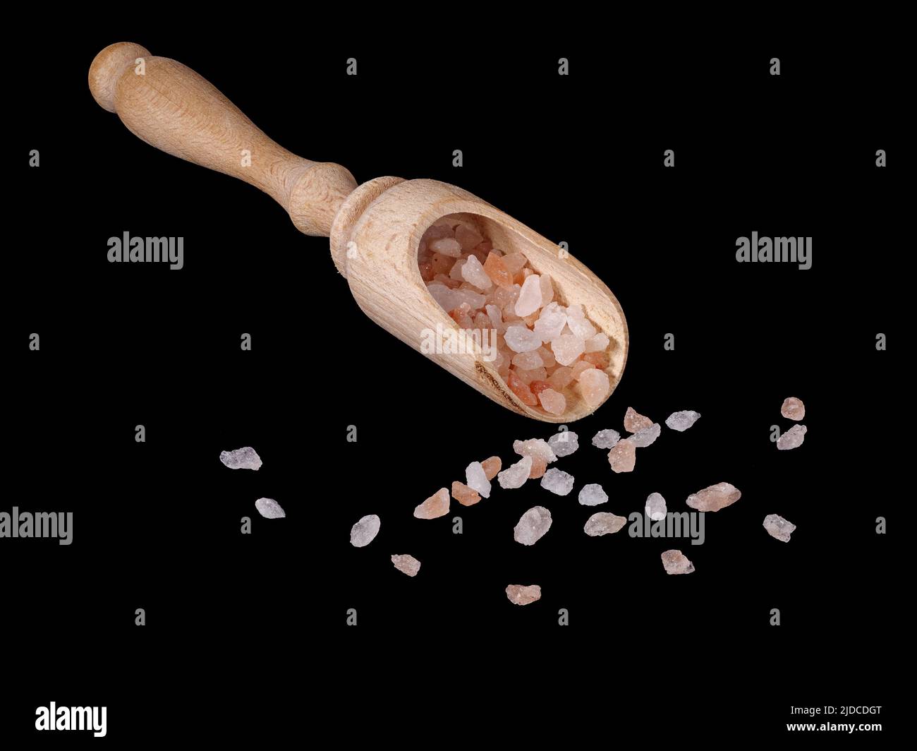 Wooden shovel with granulated sea salt isolated on black Stock Photo ...