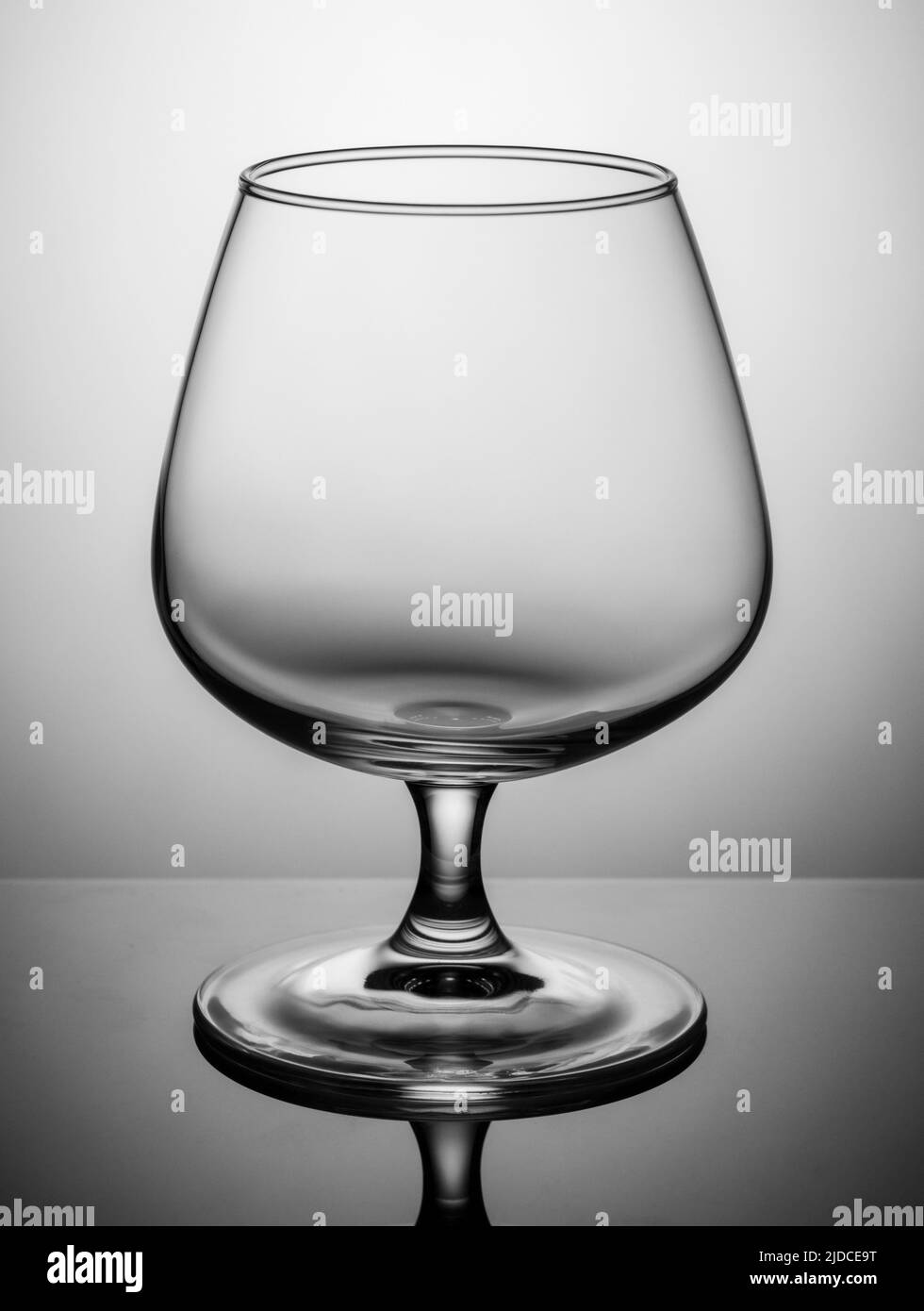 Drinking glass on table Black and White Stock Photos & Images - Alamy
