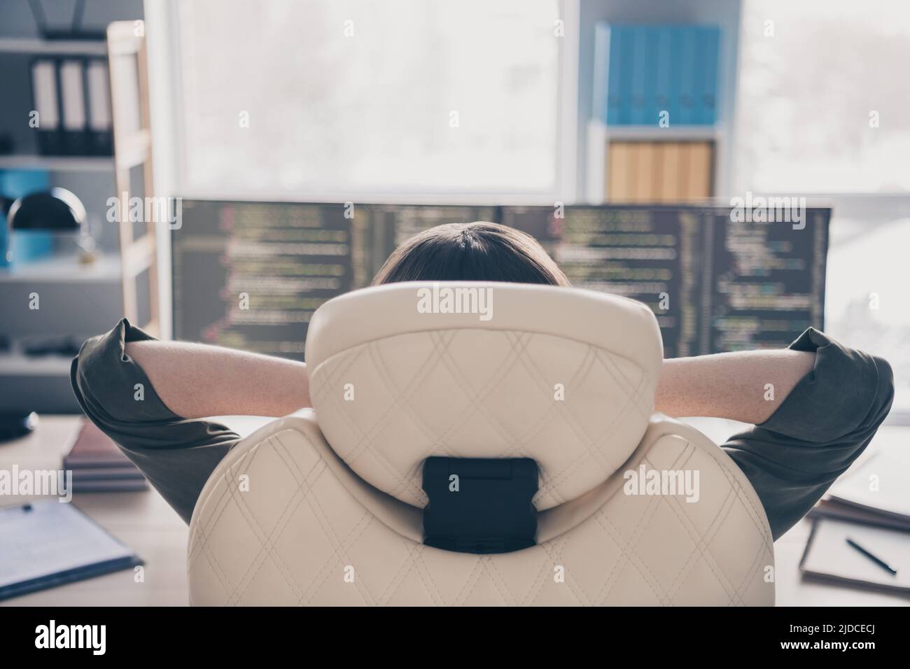 Rear back behind view portrait of qualified skilled girl geek ...