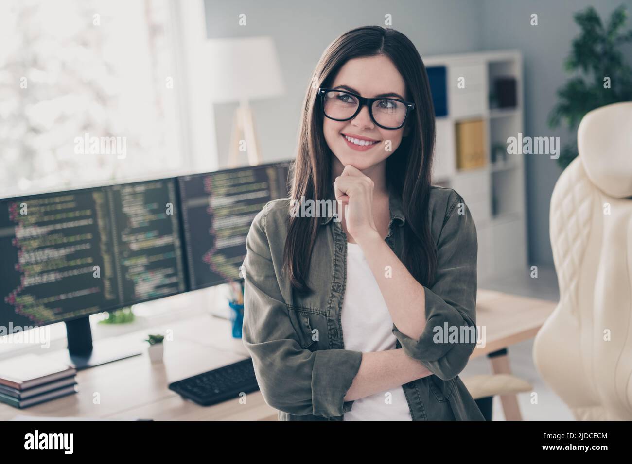 Portrait of attractive cheerful girl making decision web development ...