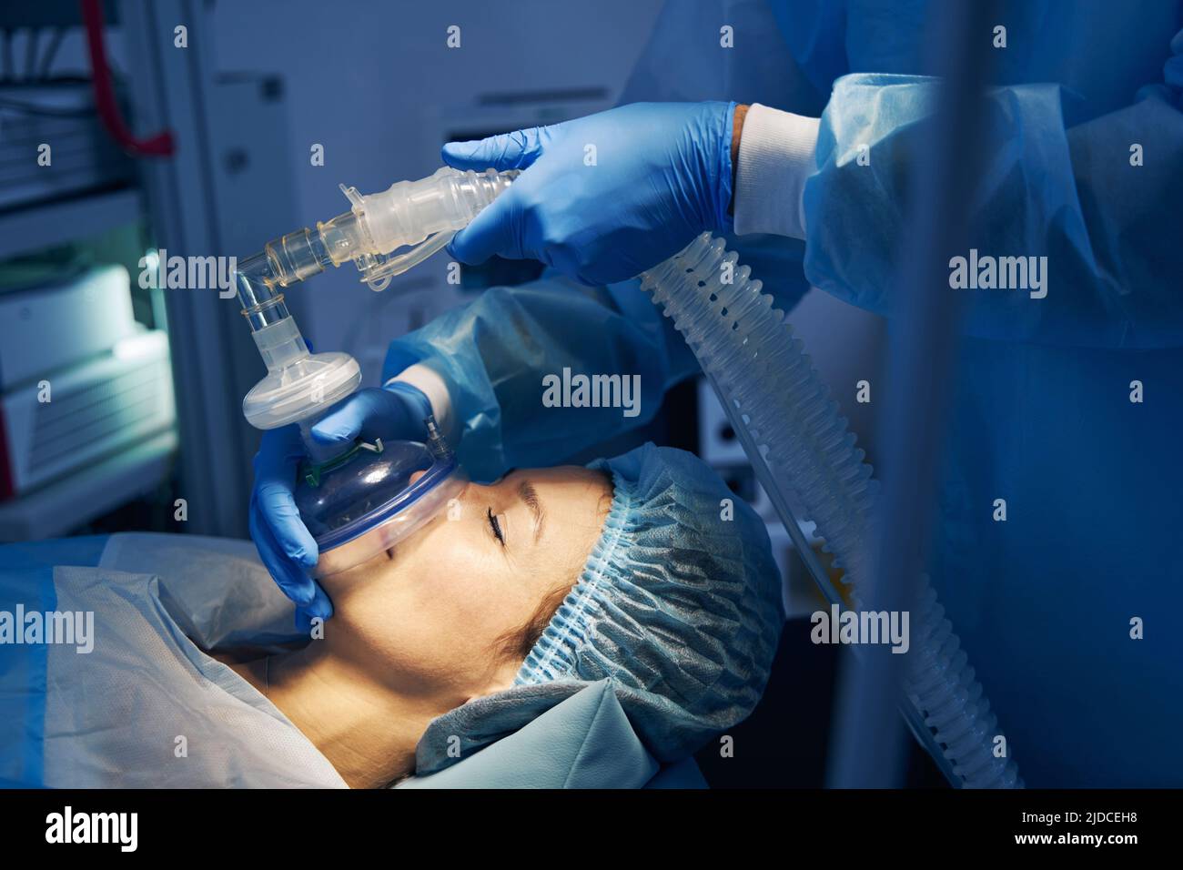 Anesthesia mask placed on the face of female patient Stock Photo - Alamy