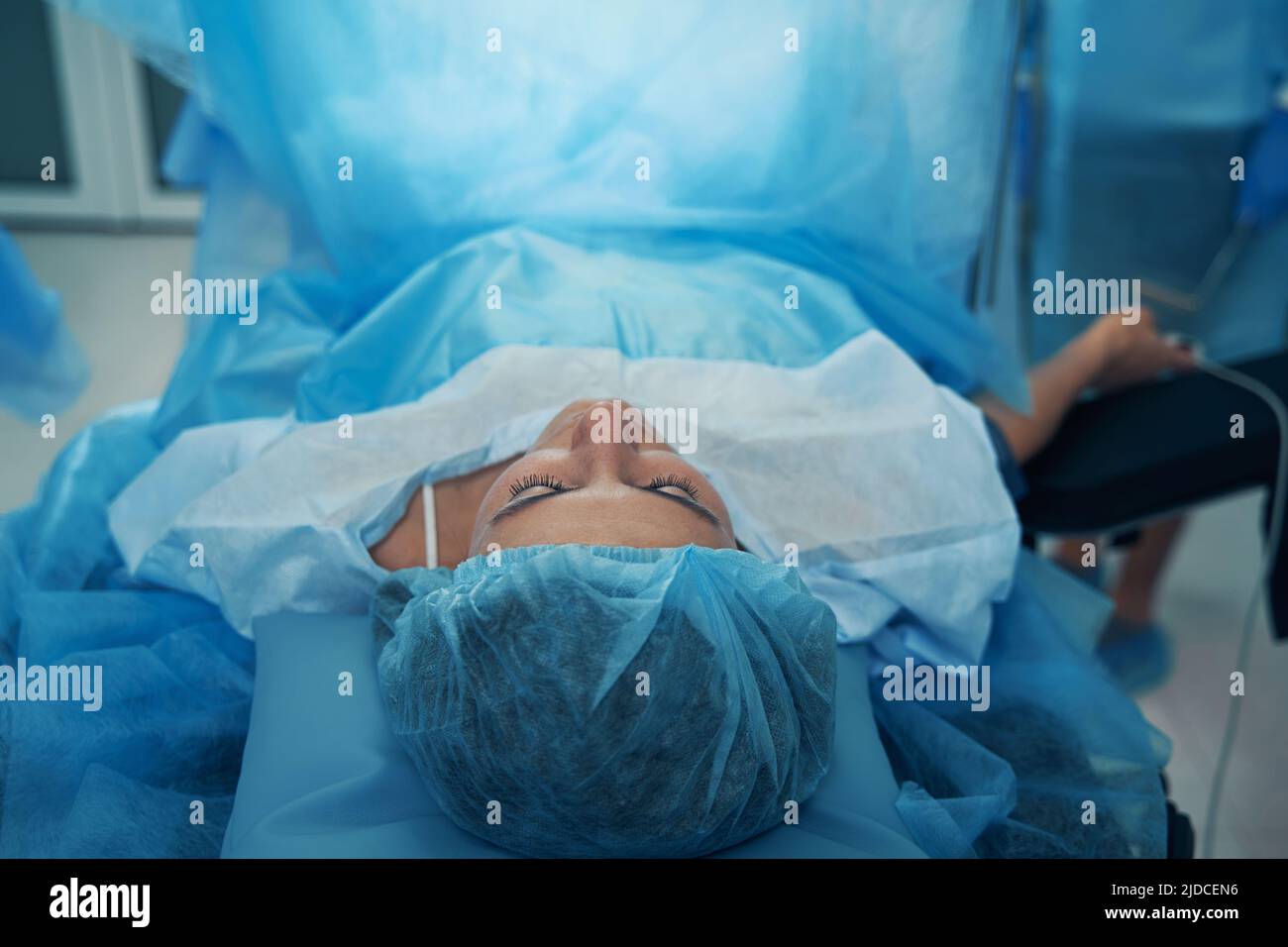 Female patient getting medical treatment in the operating theatre Stock ...