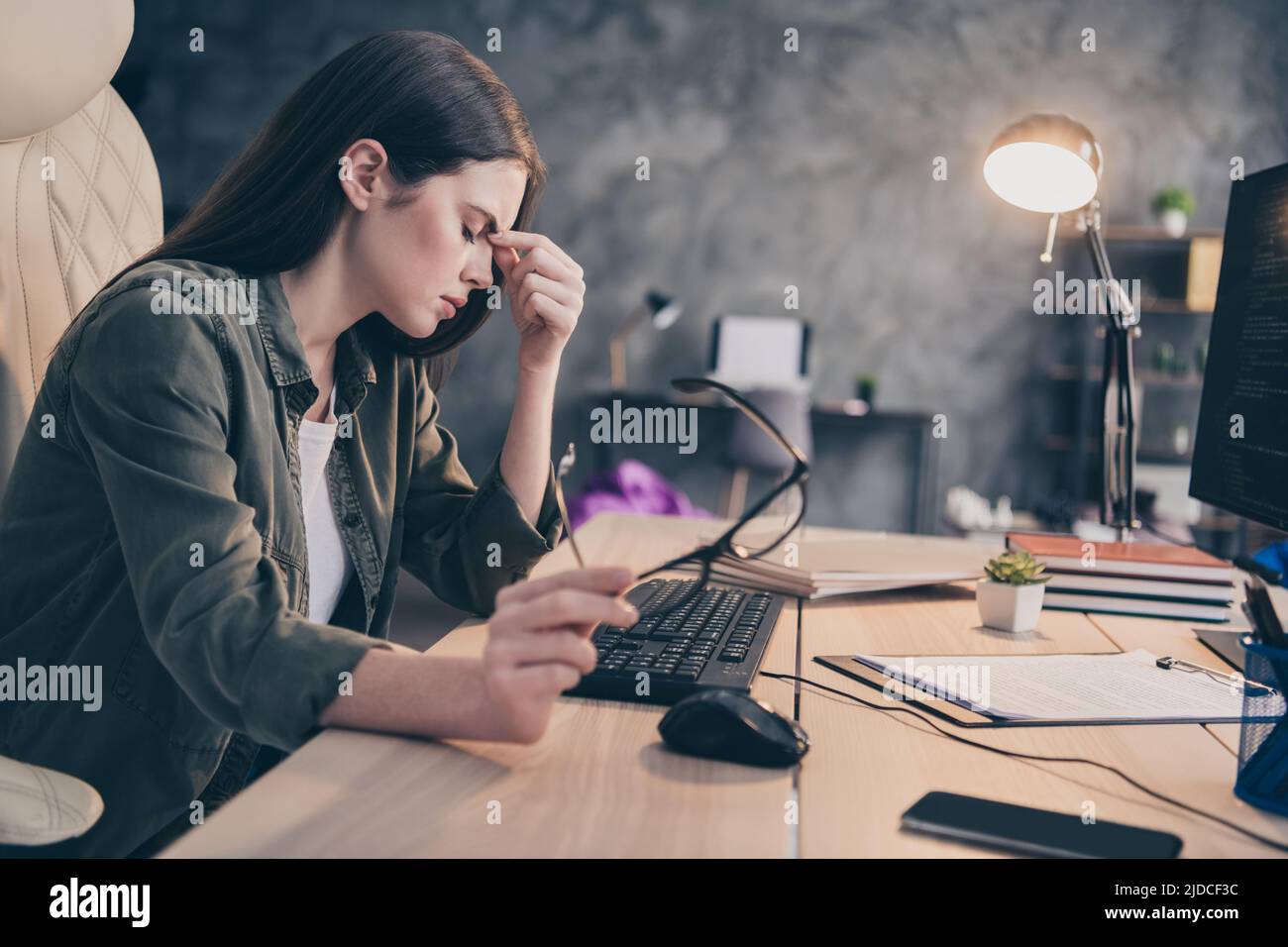 Profile side view portrait of attractive sick tired girl tech support ...