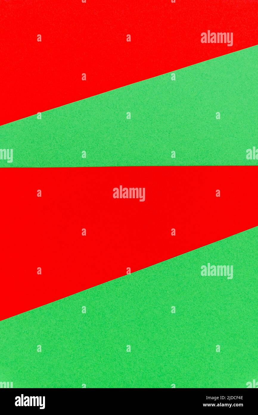 Abstract with red on green sheets vertical background. Natural bright ...