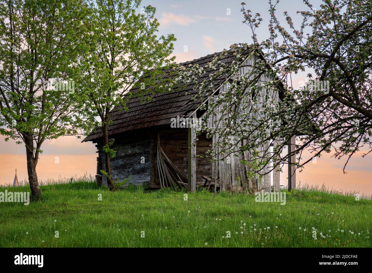 Old cabin view and sunset in Alps, landscape photo of an old building ...